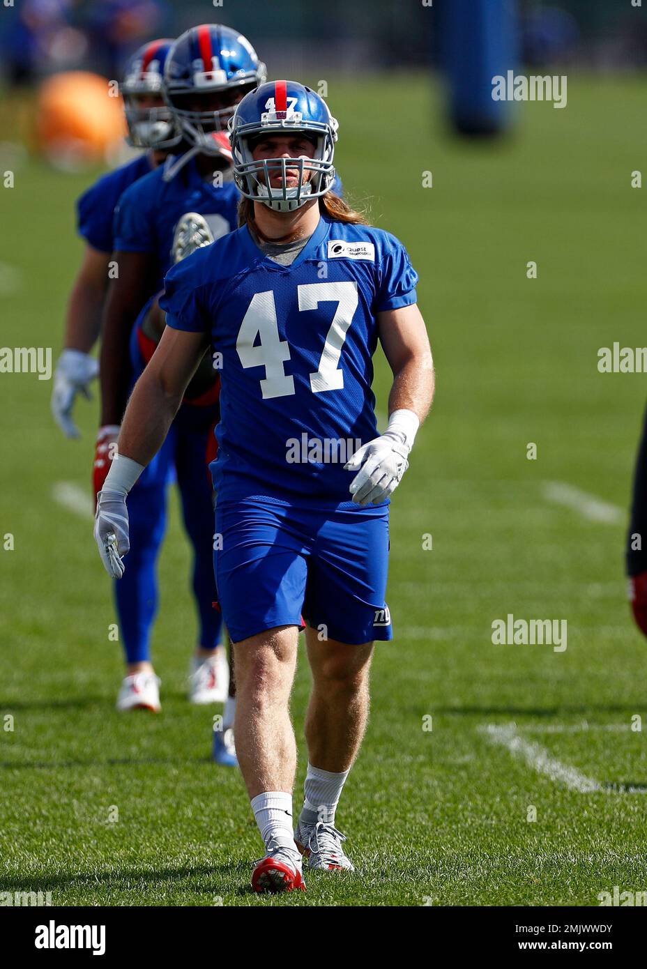 New York Giants safety Jake Carlock (47) stretches during an NFL ...