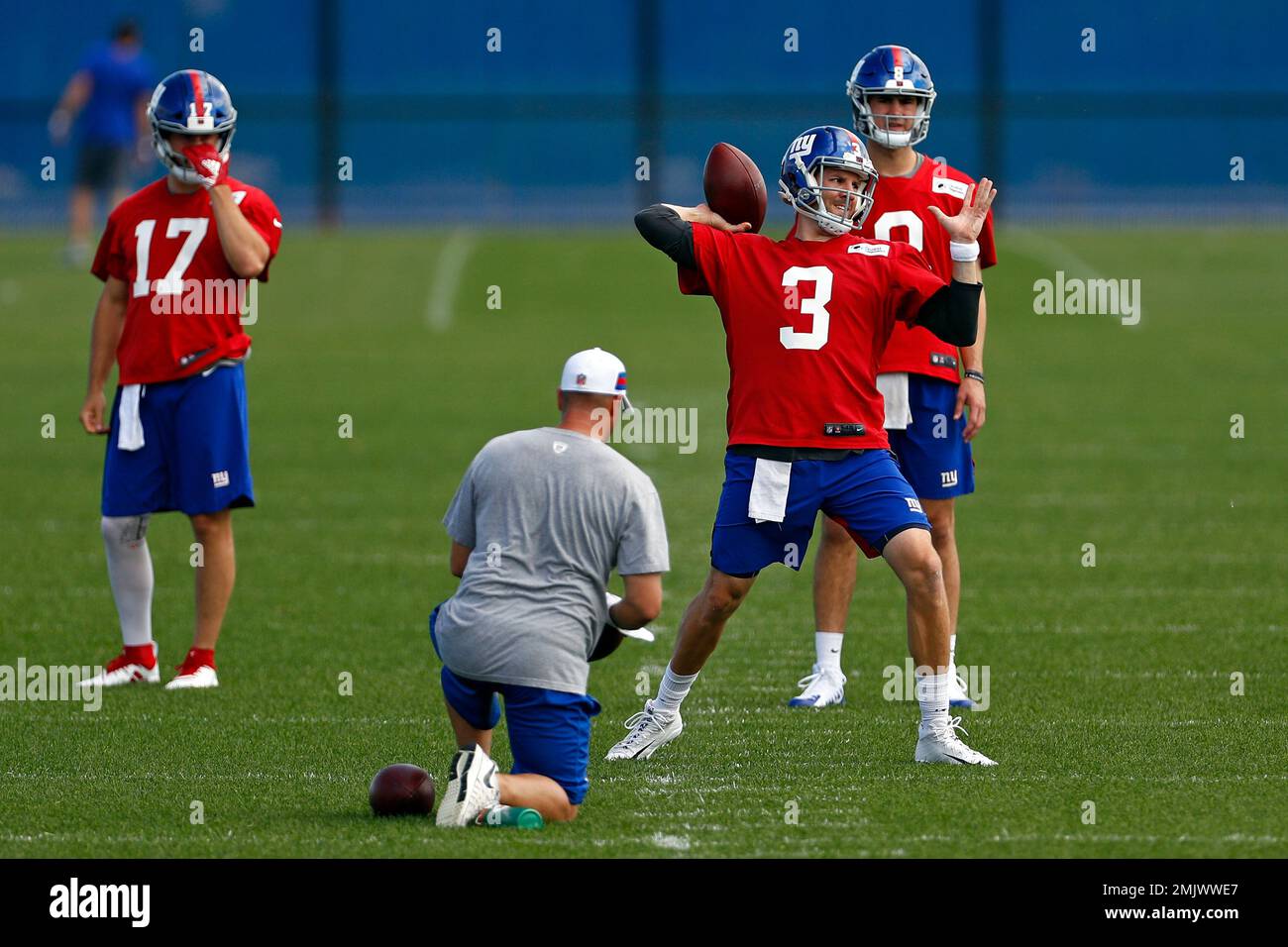 New York Giants quarterback Alex Tanney (3) throws in front of ...