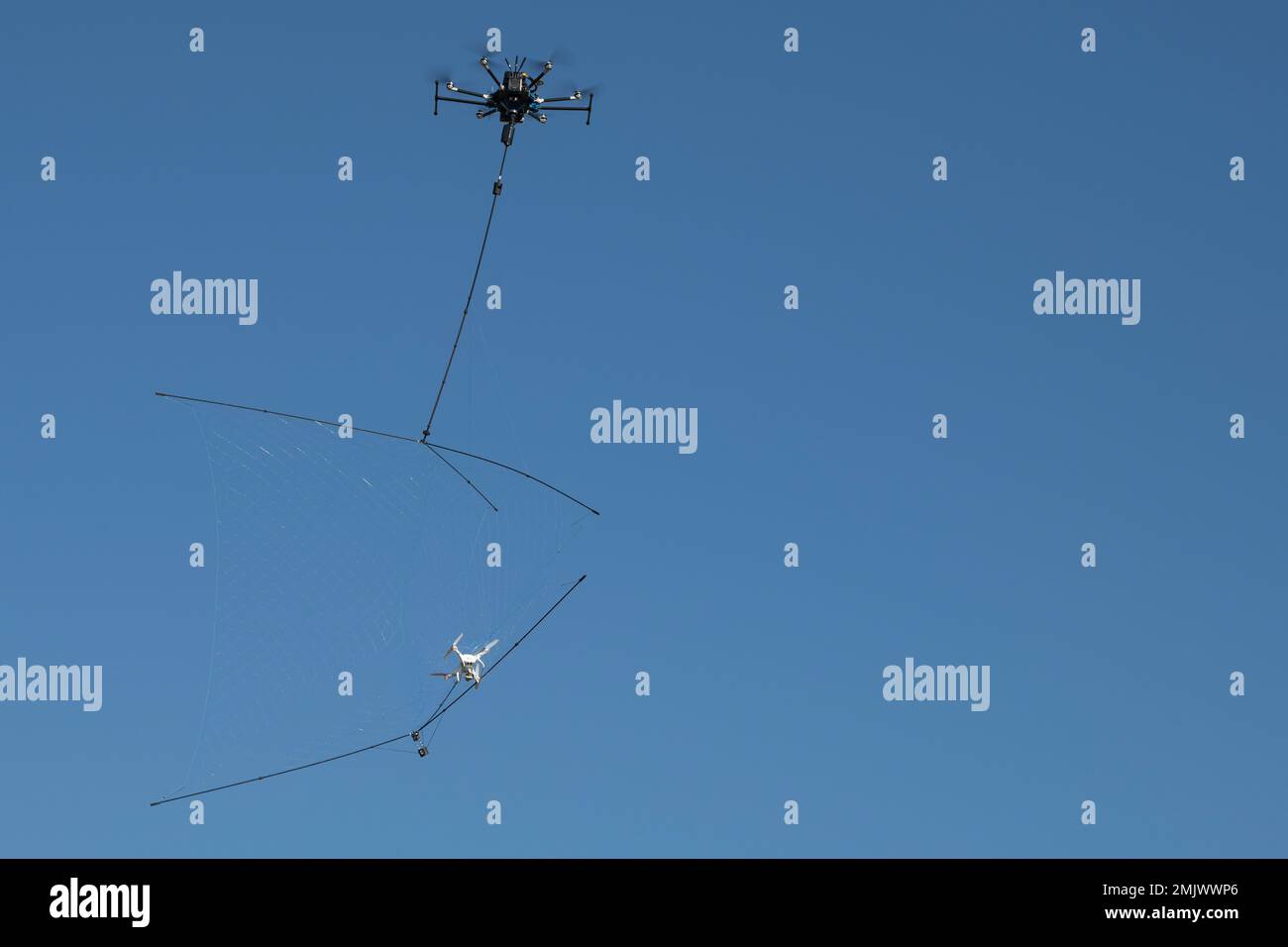 A counter-small unmanned aerial system catches a simulated foreign ...