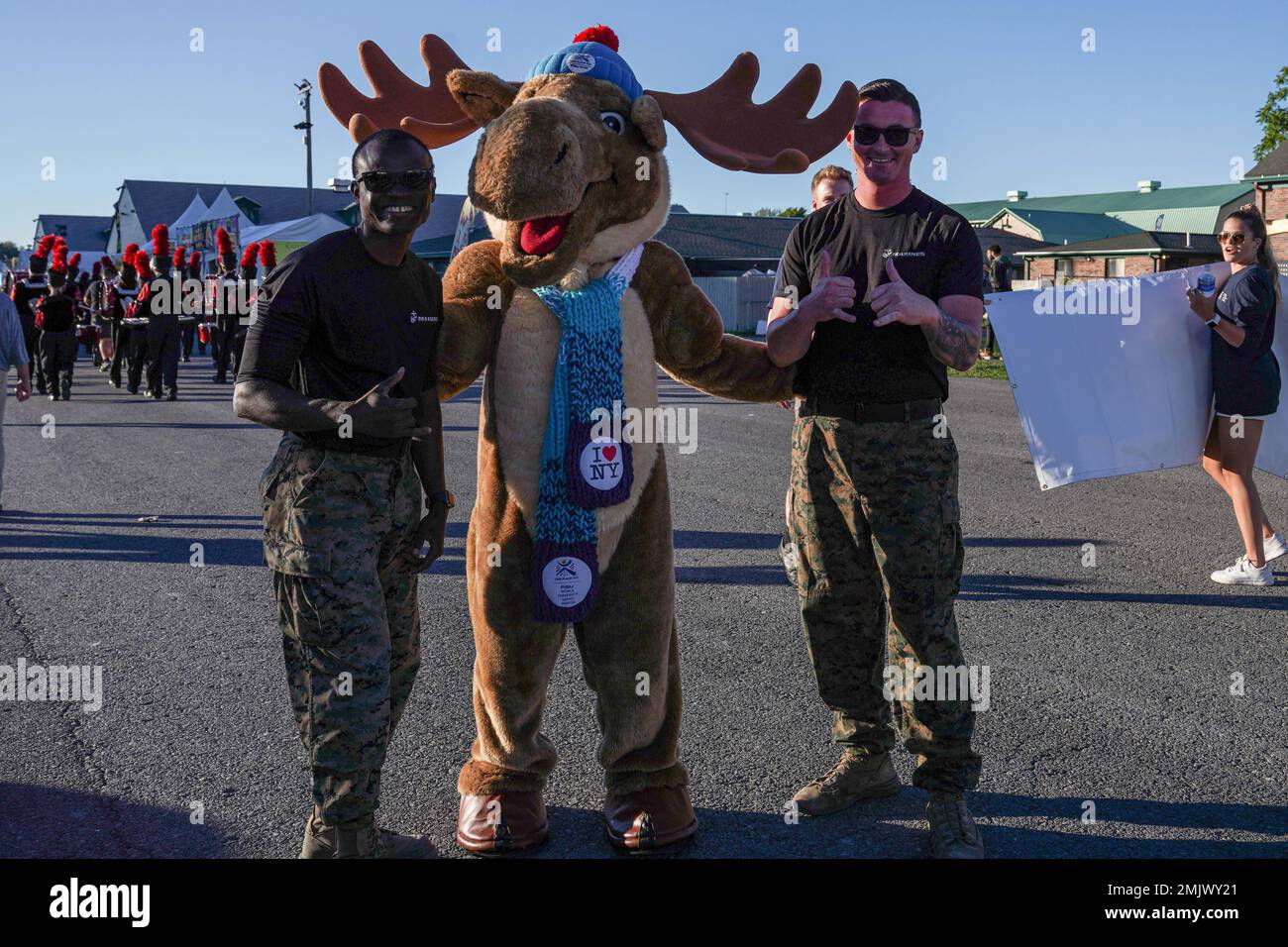 U.S. Marine Corps Sgt. Kokou Adjogble, left, and Sgt. Dustin Simmons ...