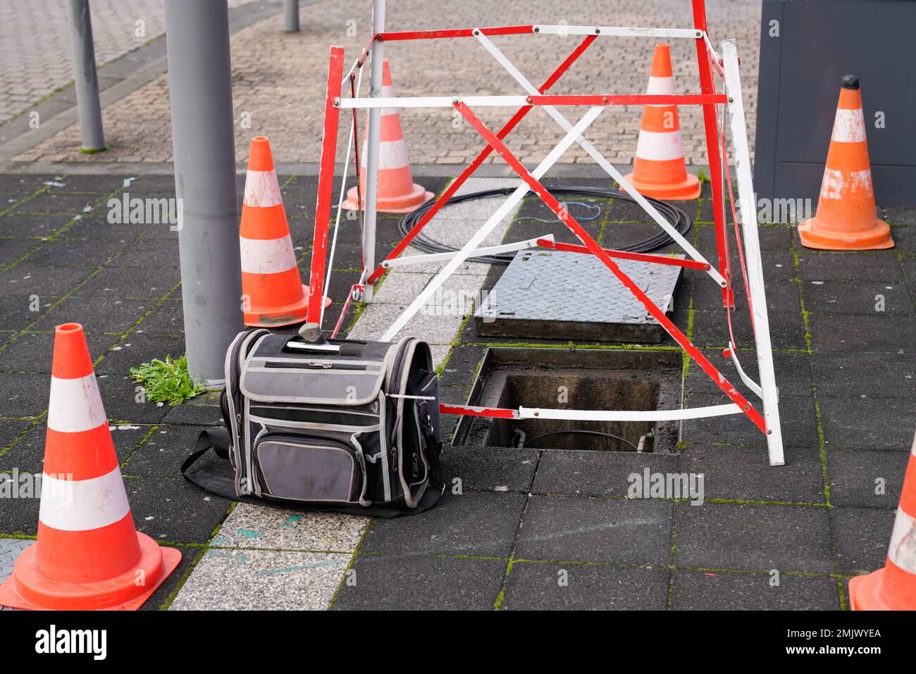 Work Fibre optic cable in city street digital fiber Internet connection ...
