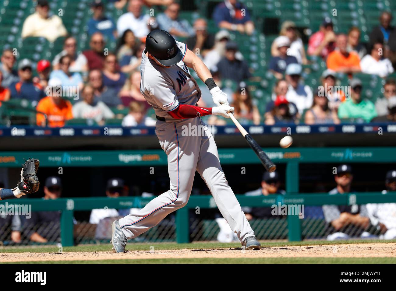 Miami Marlins' Garrett Cooper hits a grand slam in the ninth inning of ...