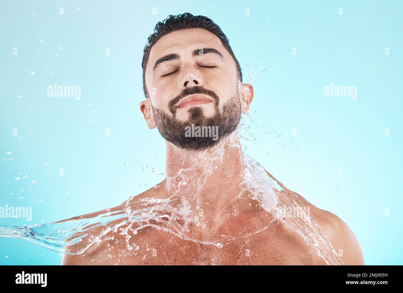 Water, splash and skincare with face of man for shower, self care and natural cosmetics. Luxury ...