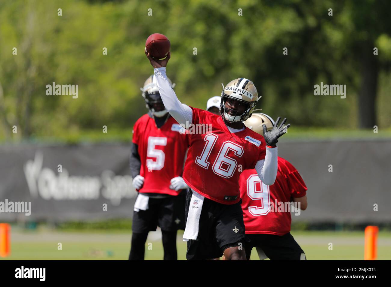 New Orleans Saints quarterback J.T. Barrett (16) works out during an ...