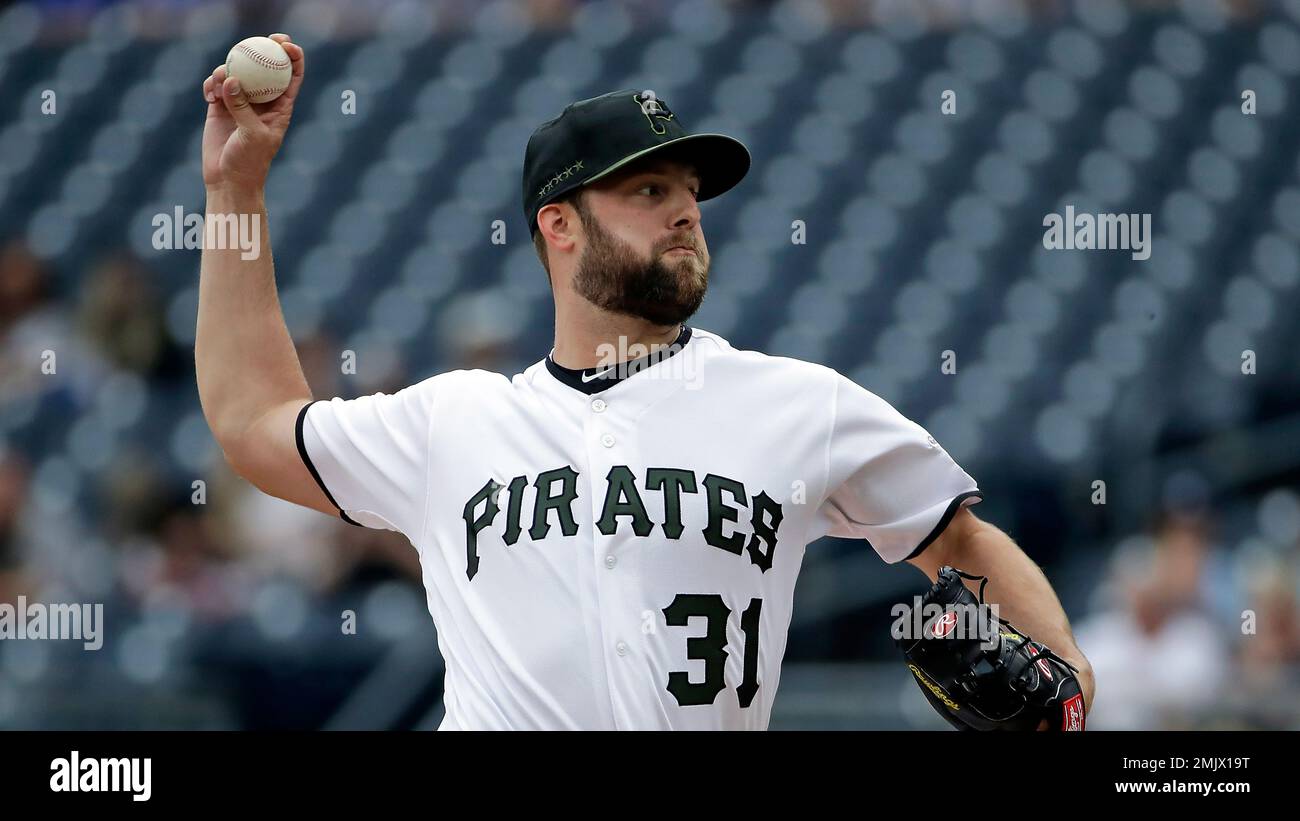 Pittsburgh Pirates relief pitcher Jordan Lyles delivers in the first ...