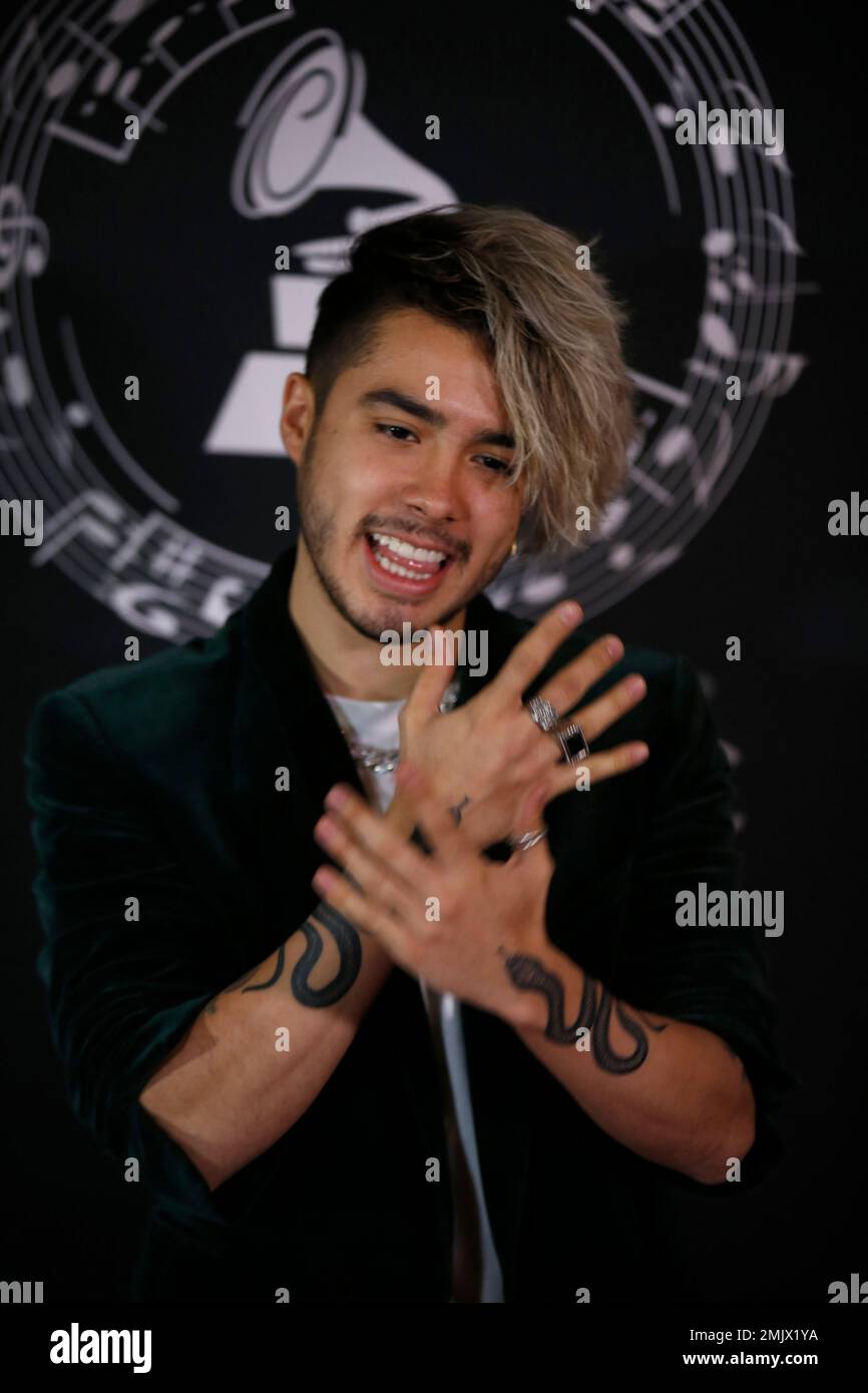 Mexican singer Mario Bautista poses for photos on the red carpet for an ...