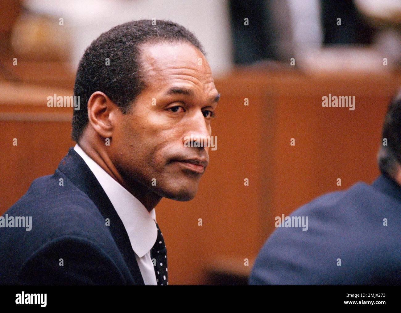 O.J. Simpson sits at his arraignment in superior Court in Los Angeles ...