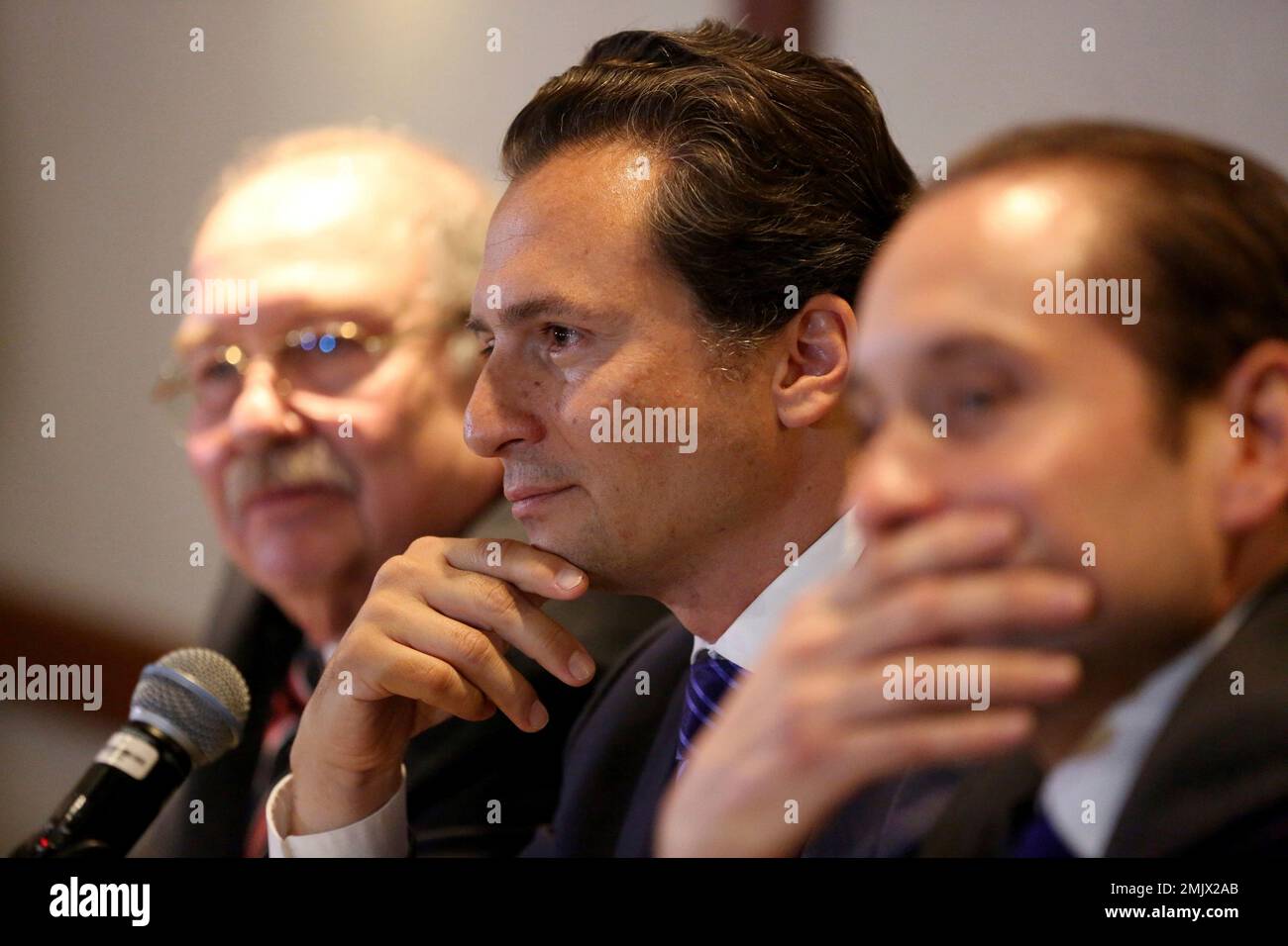 FILE - In this Aug. 17, 2017 file photo, flanked by lawyer Javier ...