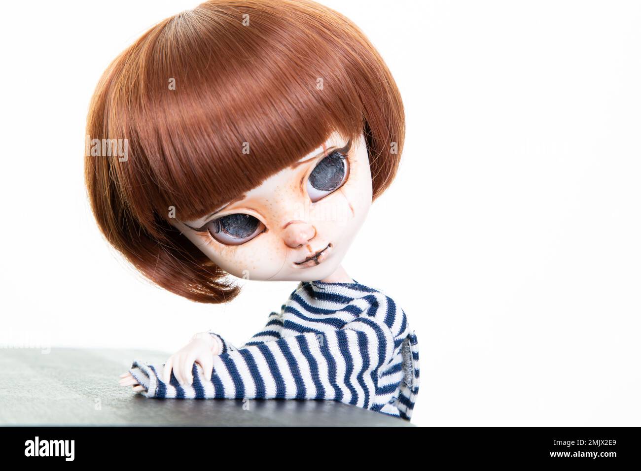 doll face portrait looking aside copy space girl childhood toys in ...