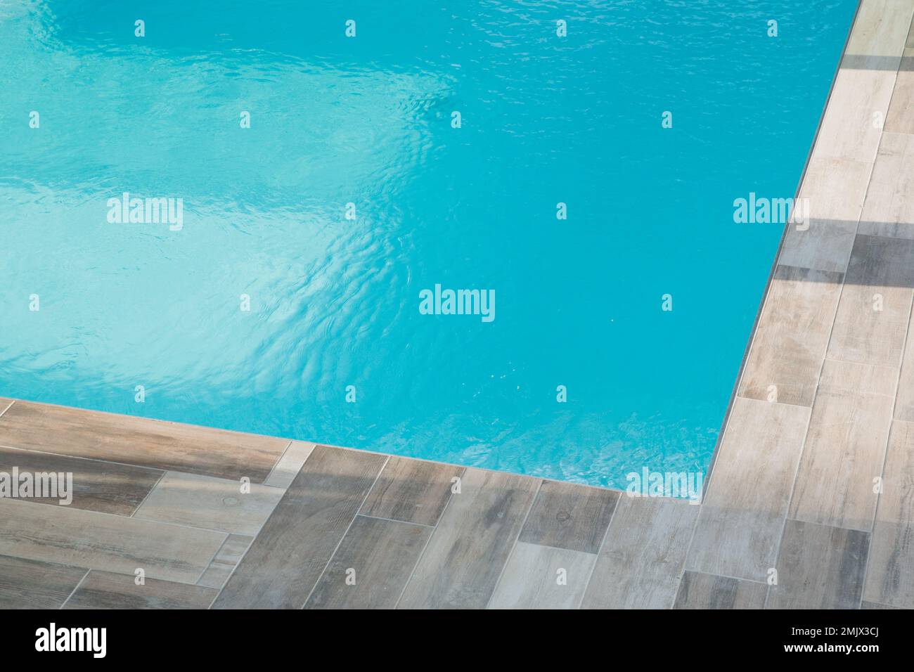 Detail of modern blue outdoor swimming pool Stock Photo - Alamy