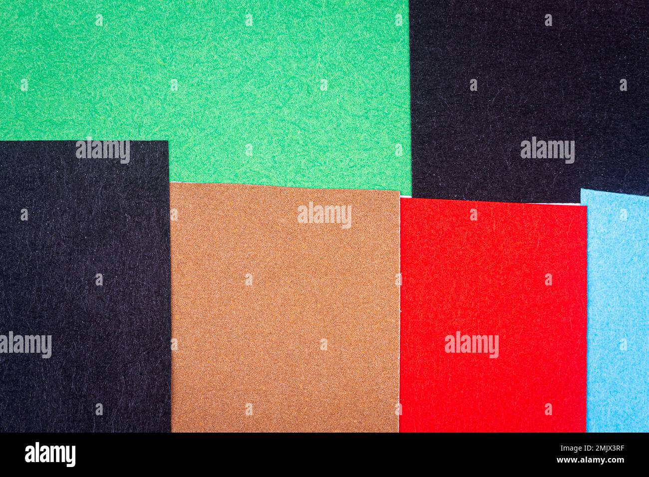 Multicolor background from a paper of different colors. Abstract ...