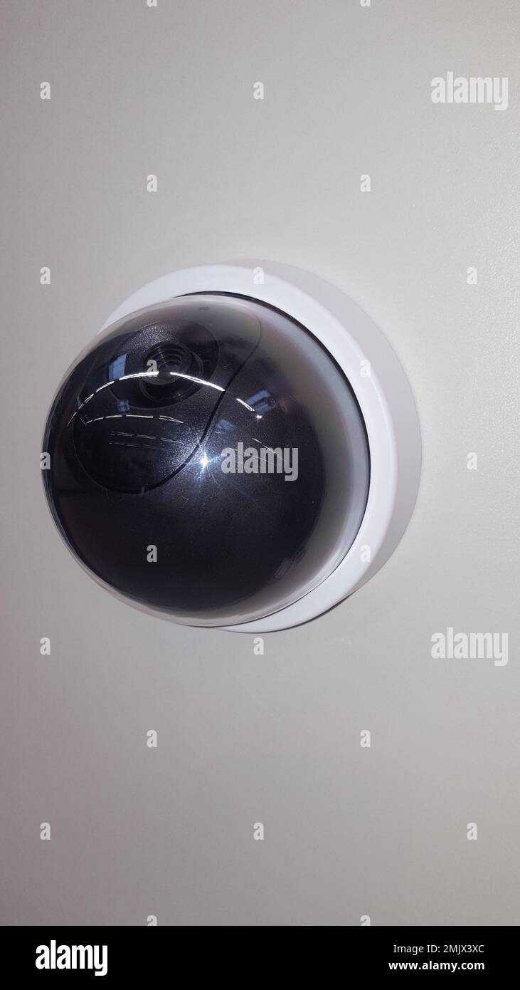 Security Cameras CCTV surveillance on white wall Stock Photo - Alamy