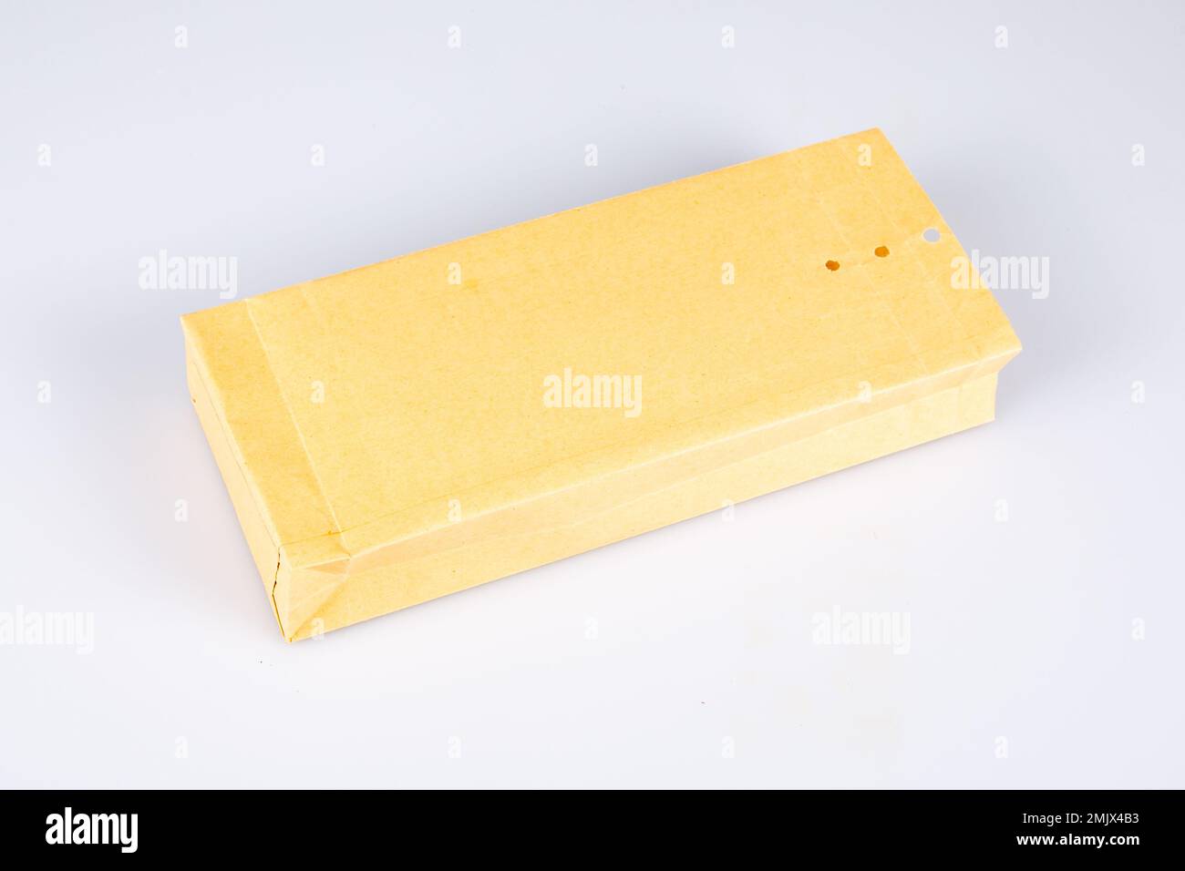 Kraft brown paper square perforated closure envelope on white ...