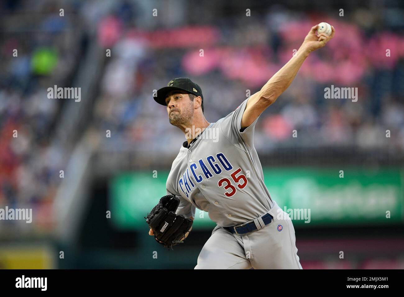 Chicago Cubs starting pitcher Cole Hamels (35) delivers a pitch during ...