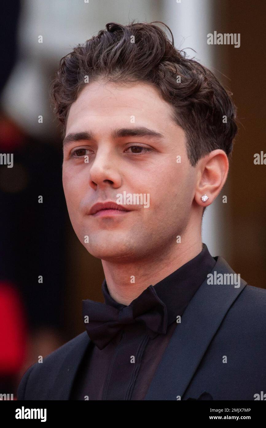 Director Xavier Dolan poses for photographers upon arrival at the ...