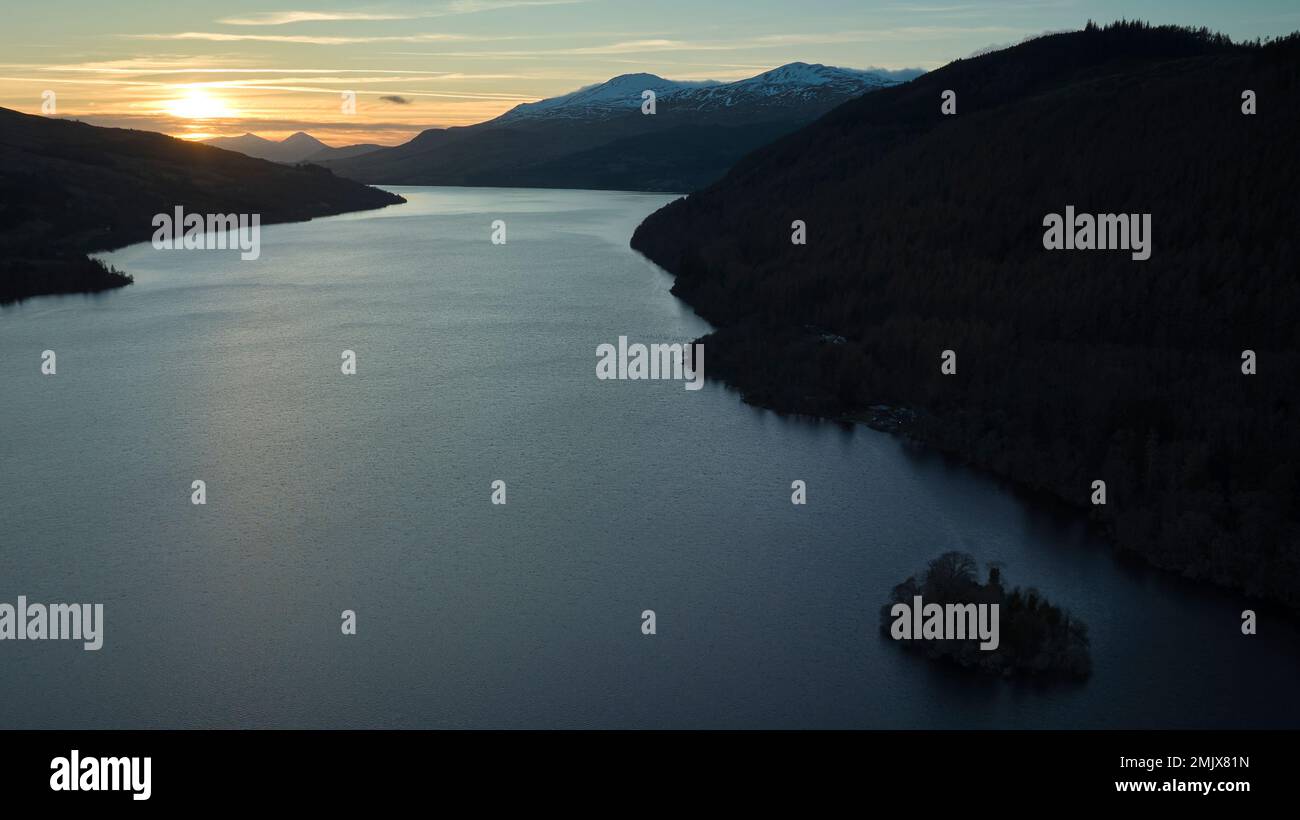 Aerial shot of Loch Tay at Kenmore with it's islands and Ben Lawers on ...