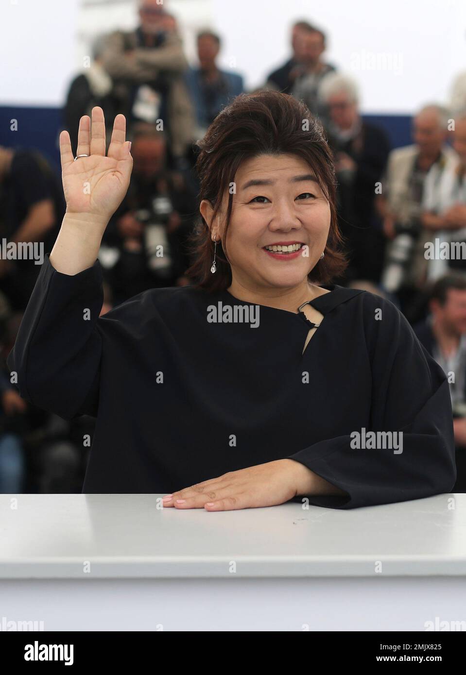 Actress Lee Jung-Eun poses for photographers at the photo call for the film 'Parasite' at the ...