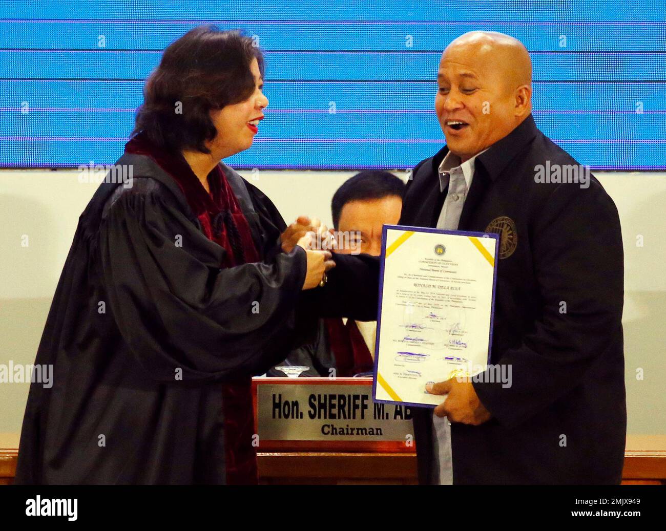 Newly-elected Senator Ronald dela Rosa, right, receives his election ...