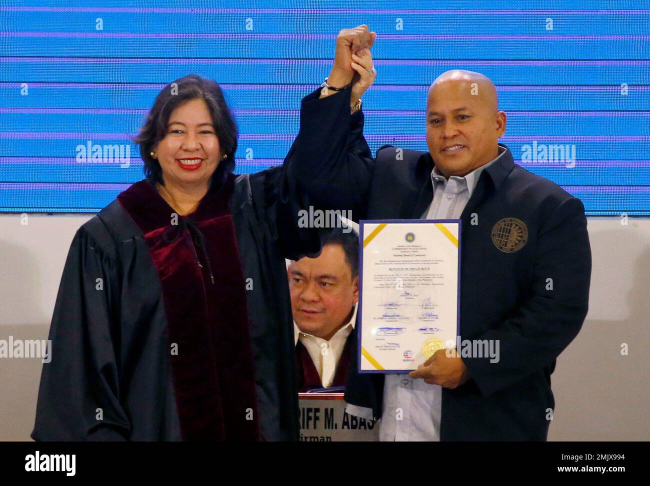 Commissioner Socorro Inting, left, of the Commission on Elections ...