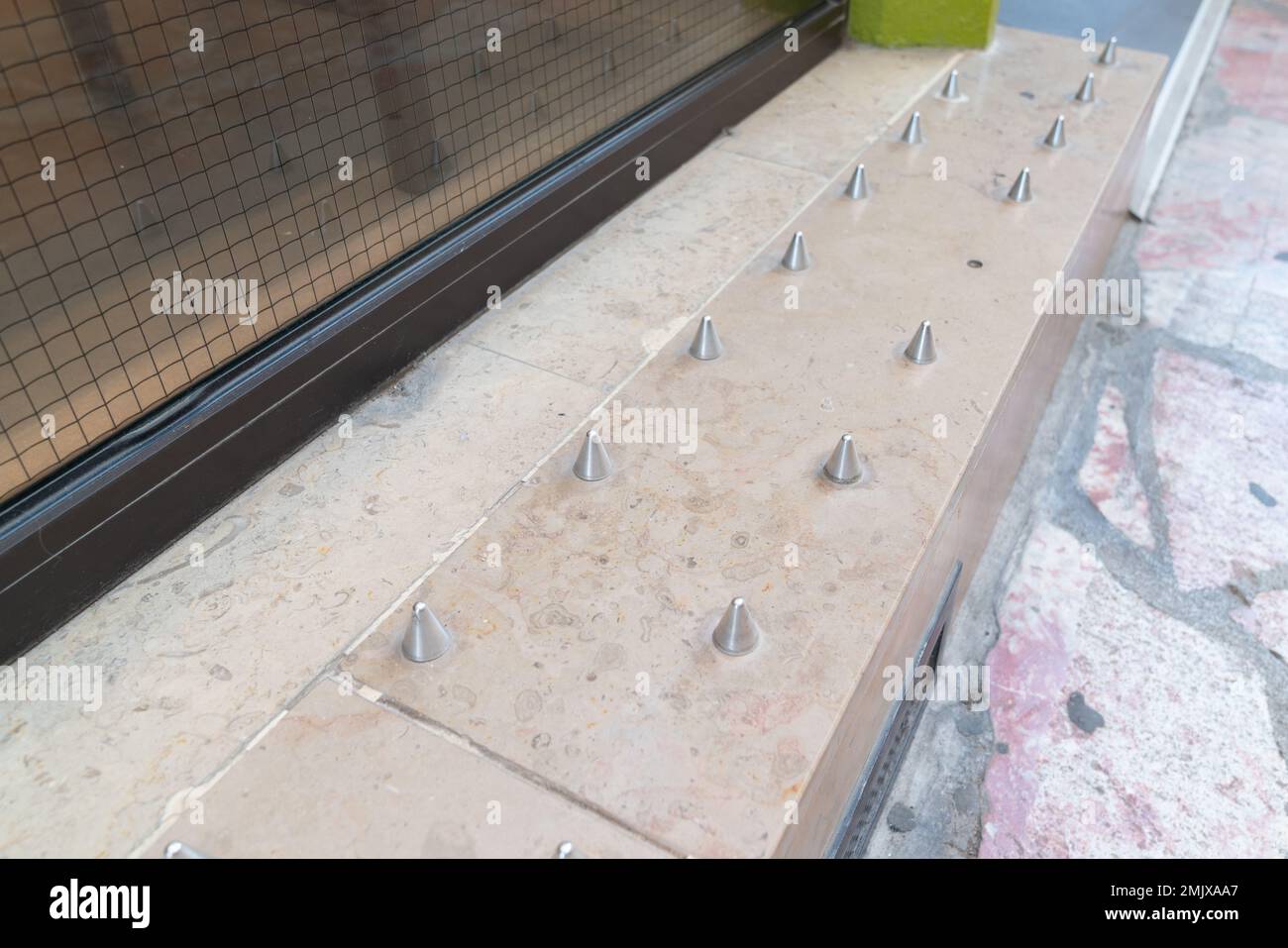 Anti-homeless spikes hostile architecture defensively designed street ...