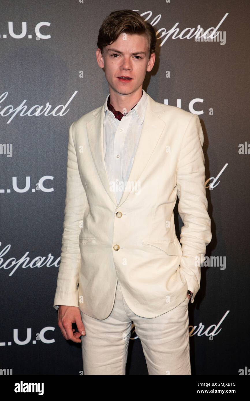 Thomas Brodie-Sangster poses for photographers upon arrival at the ...