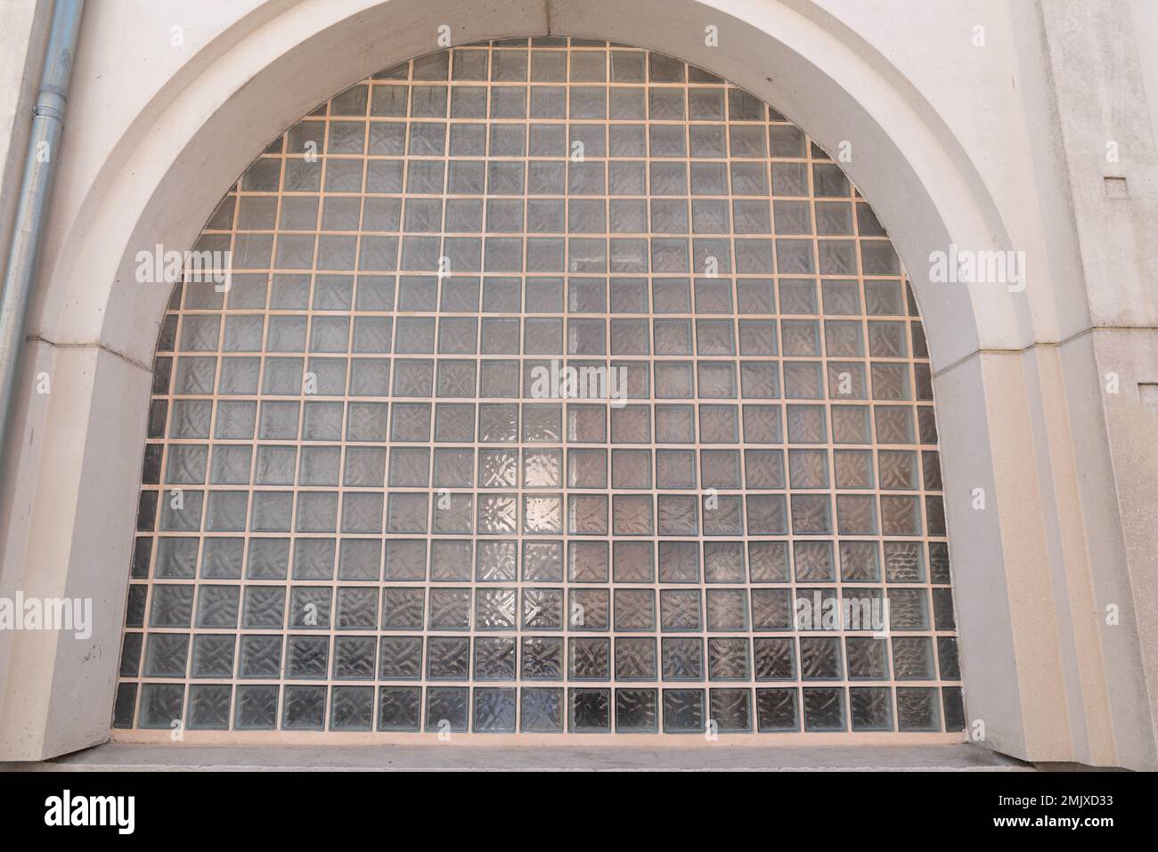 glass block cube window in round ancient building Stock Photo - Alamy