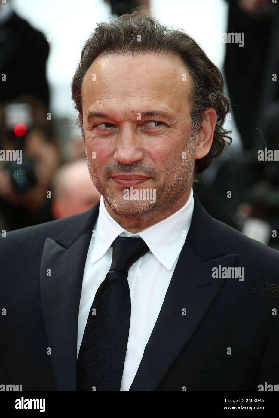 Actor Vincent Perez poses for photographers upon arrival at the ...