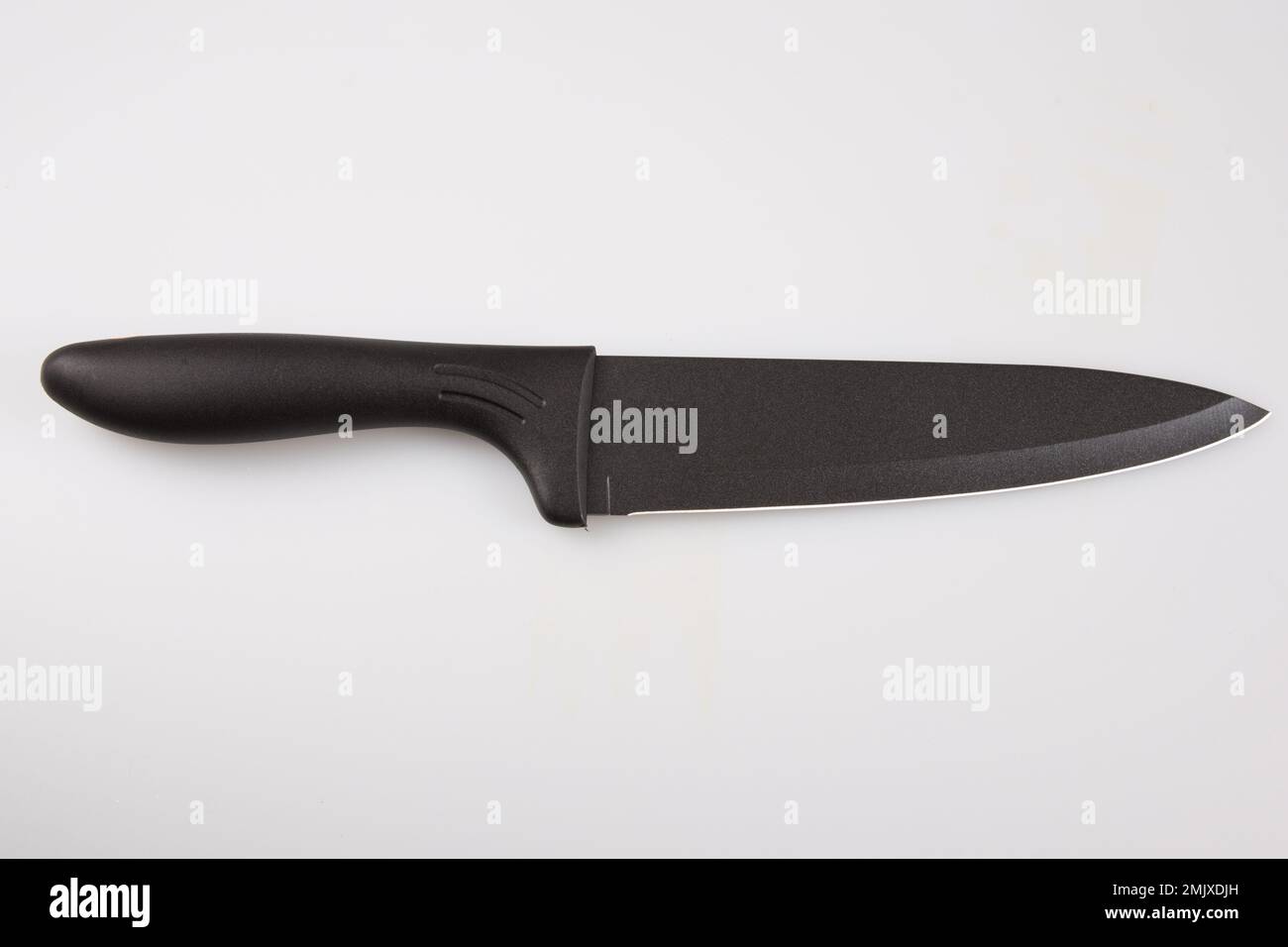Butcher black Kitchen Knife on isolated white background Stock Photo ...