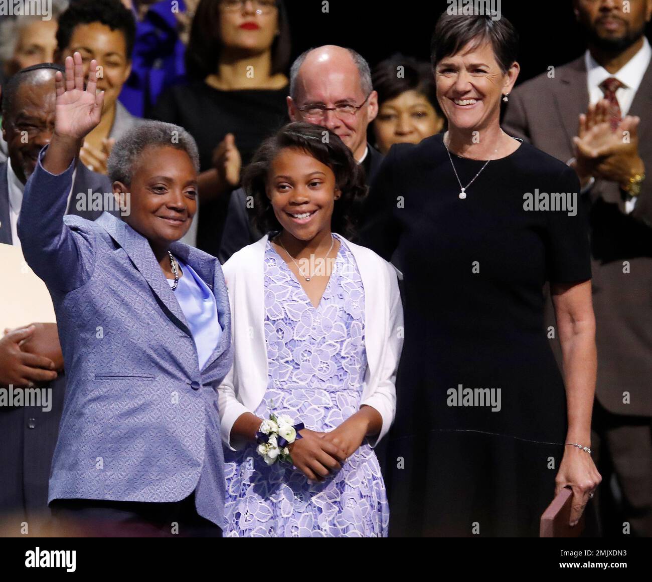 Mayor of Chicago Lori Lightfoot, left, is joined on stage with her ...