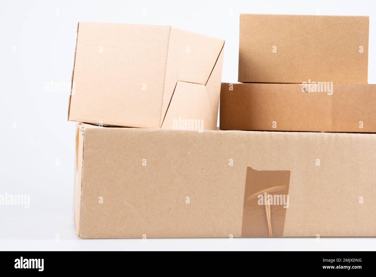 stacks of brown cardboard boxes Stock Photo - Alamy