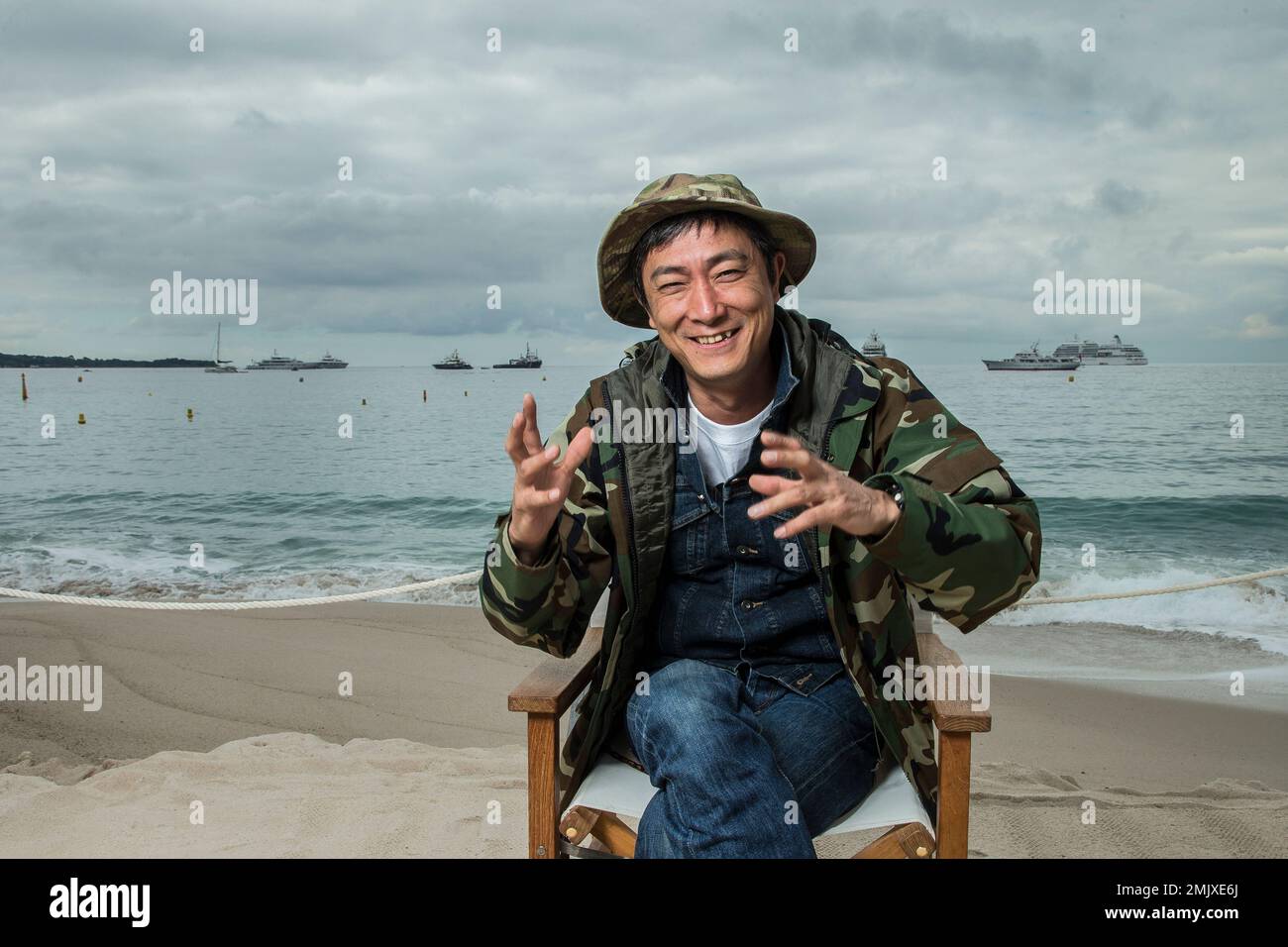 Director Katsuya Tomita poses for portraits for the film Tenzo, on the beach at the 72nd ...