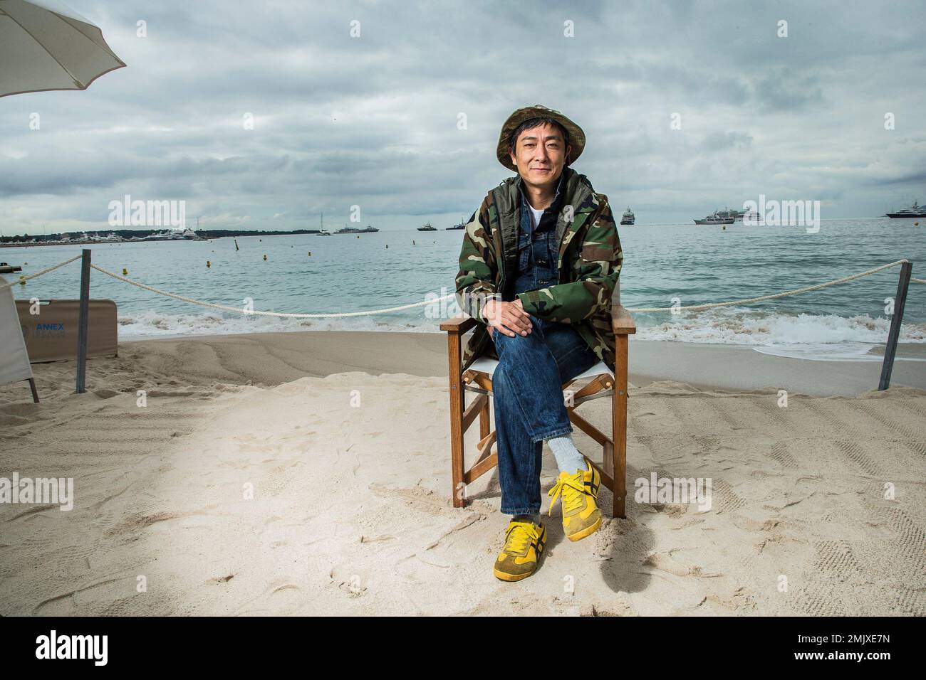 Director Katsuya Tomita poses for portraits for the film Tenzo, on the beach at the 72nd ...