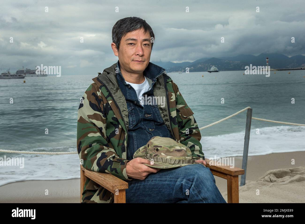 Director Katsuya Tomita poses for portraits for the film Tenzo, on the beach at the 72nd ...