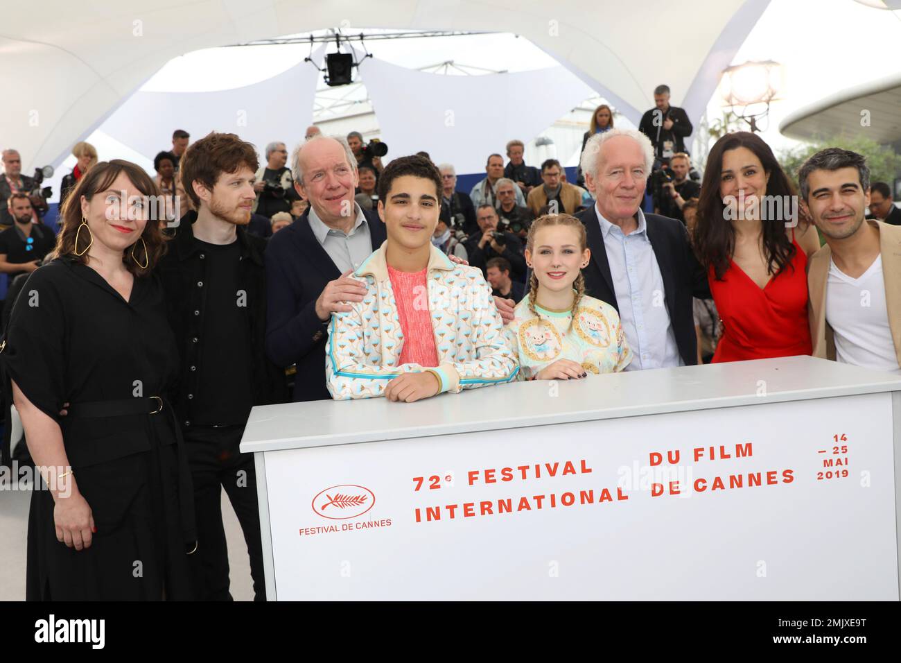 Actors Claire Bodson, from left, Olivier Bonnaud, director Luc Dardenne ...