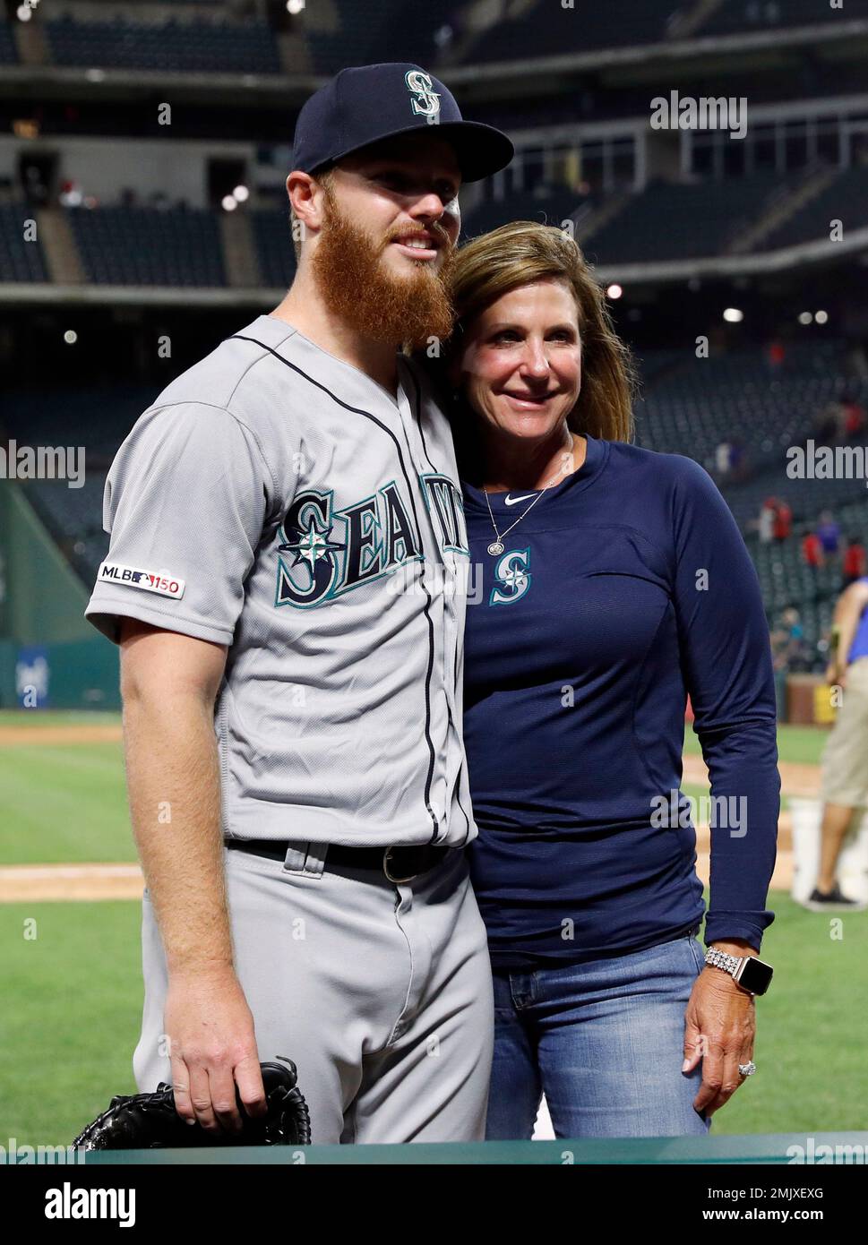Seattle Mariners relief pitcher David McKay, left, poses for a photo ...