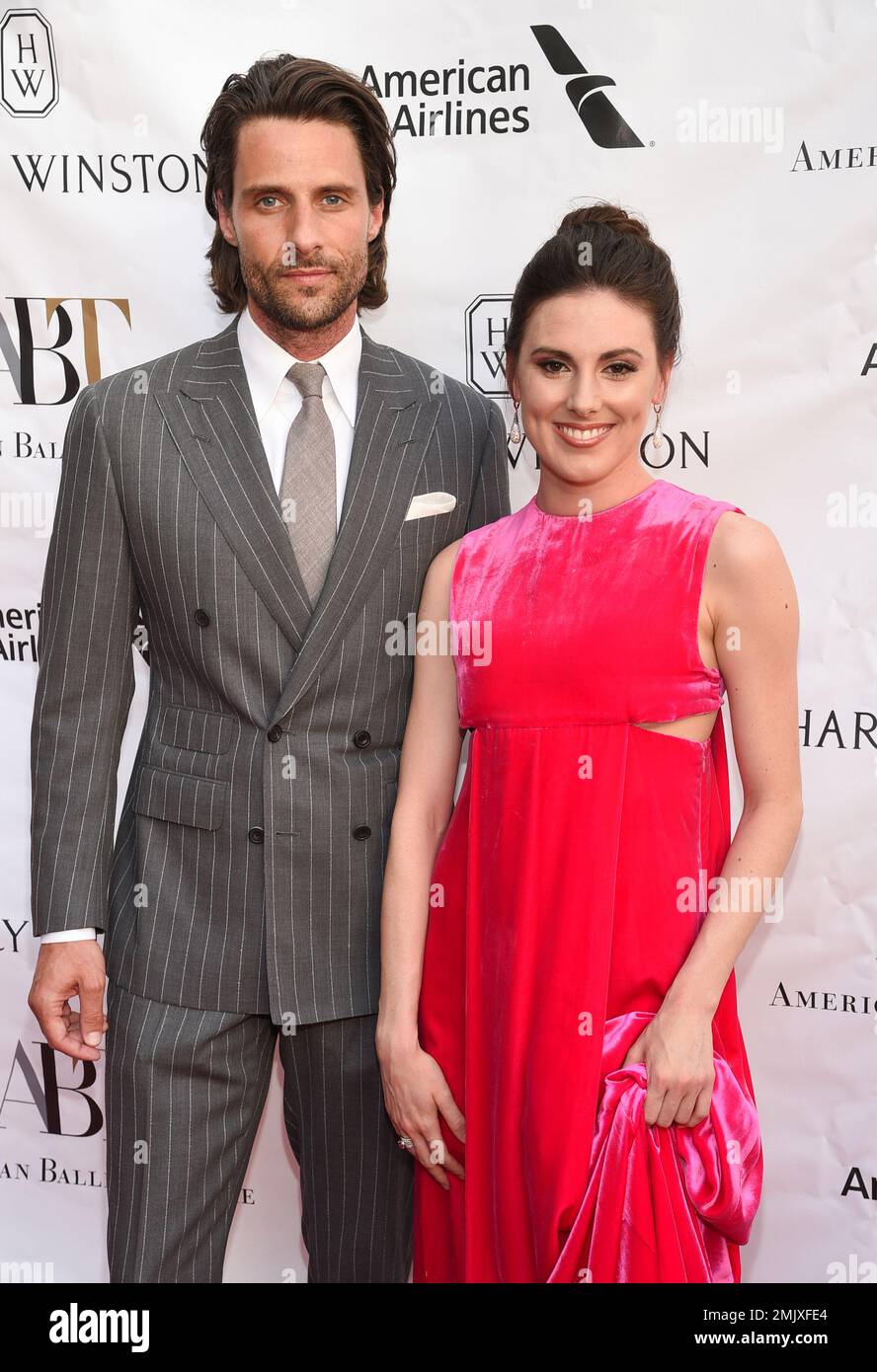 Model Tommy Dunn, left, and dancer-actress Tiler Peck attend the ...