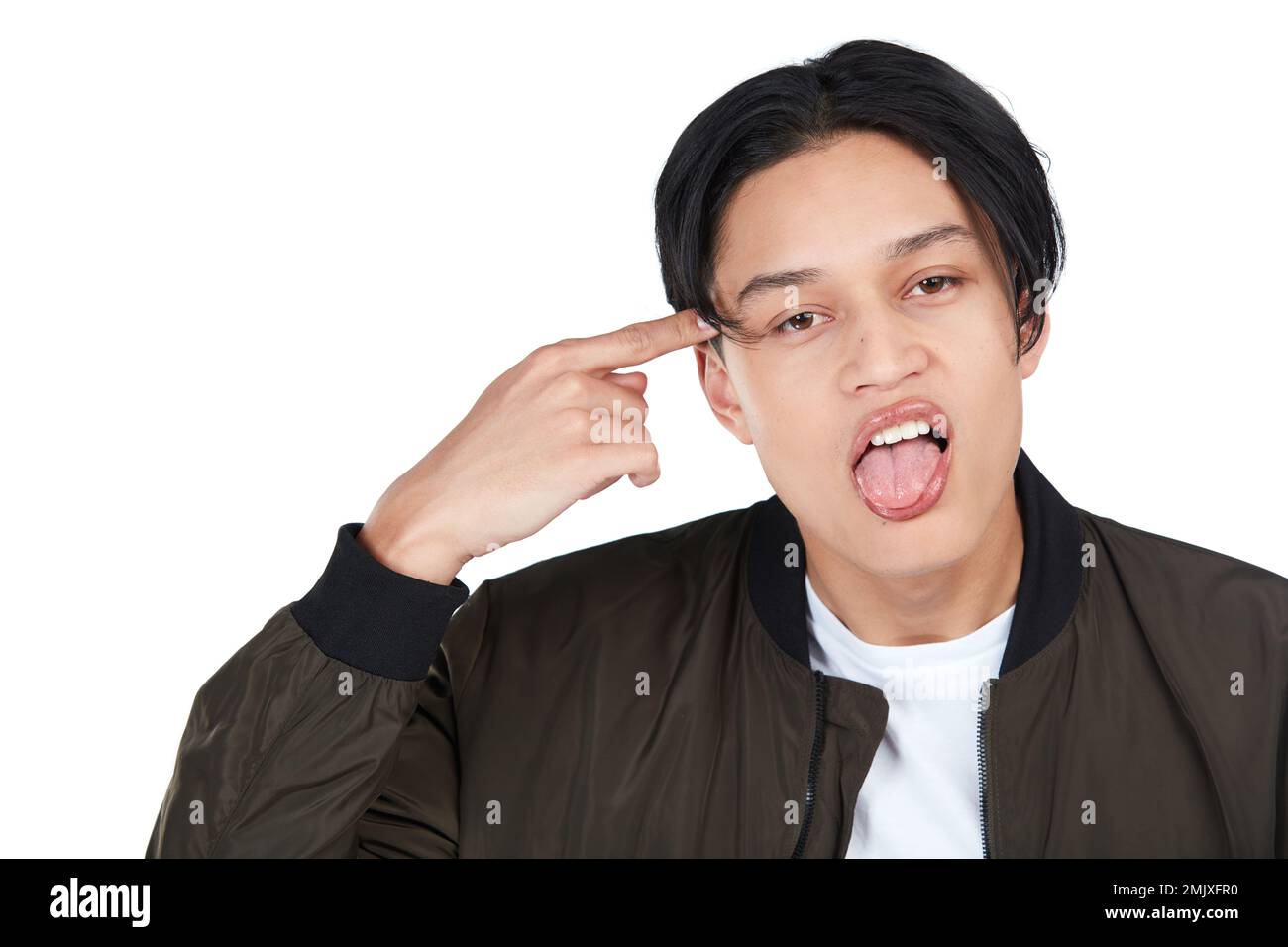 Portrait, rude and crazy with an asian man in studio isolated on a ...