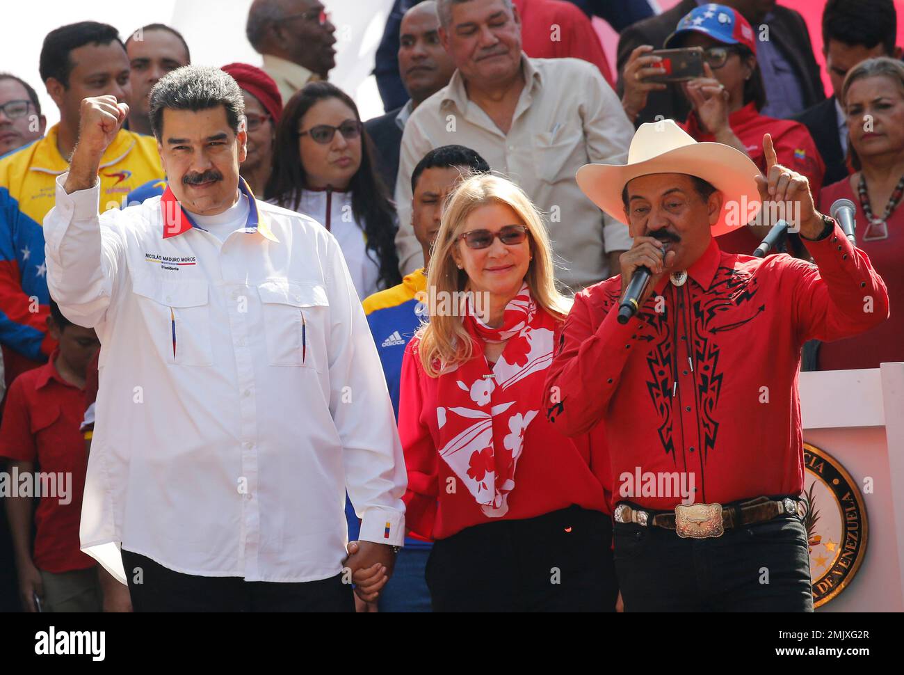 Venezuela's President Nicolas Maduro and his wife Cilia Flores stand ...