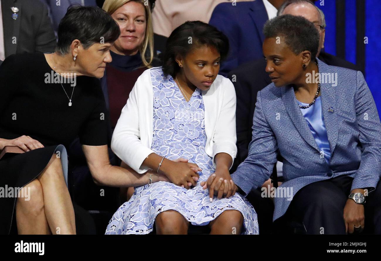 Mayor of Chicago Lori Lightfoot, right, is joined on stage with her ...