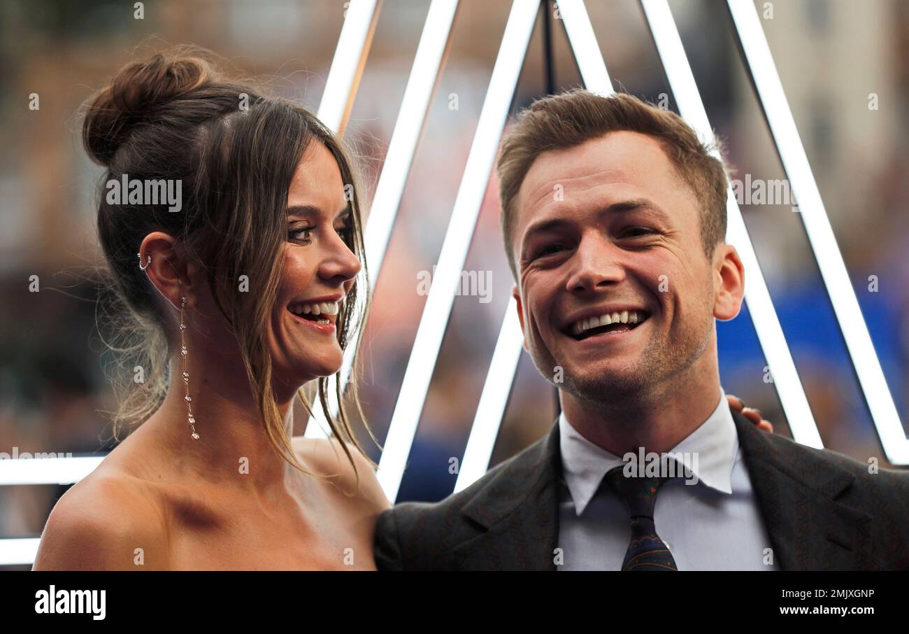 Actor Taron Egerton and girlfriend Emily Thomas arrive for the UK Film ...