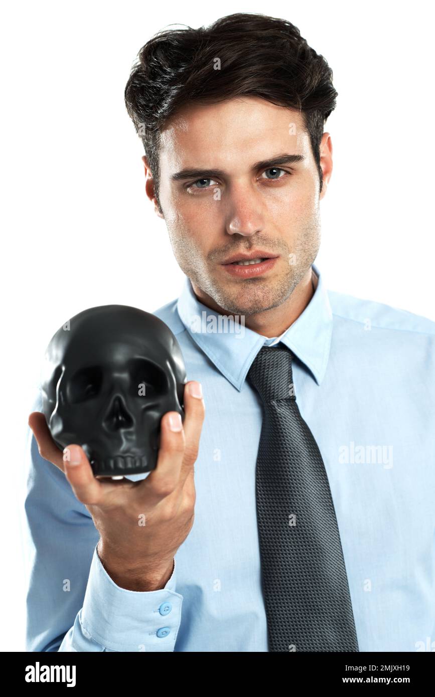 Portrait, businessman and black skull in hand in studio for death ...