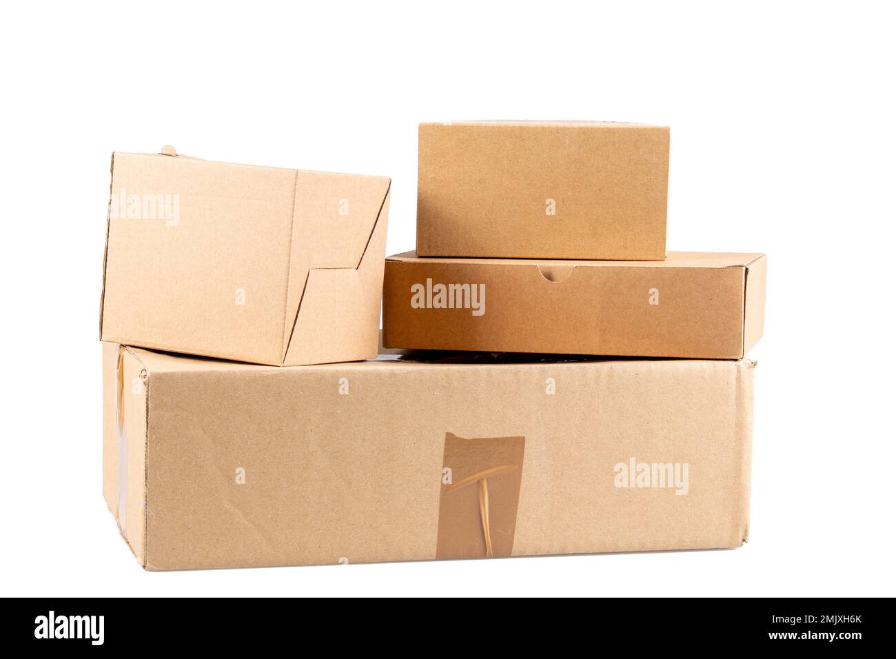 piles of brown used cardboard boxes on a white background Stock Photo ...