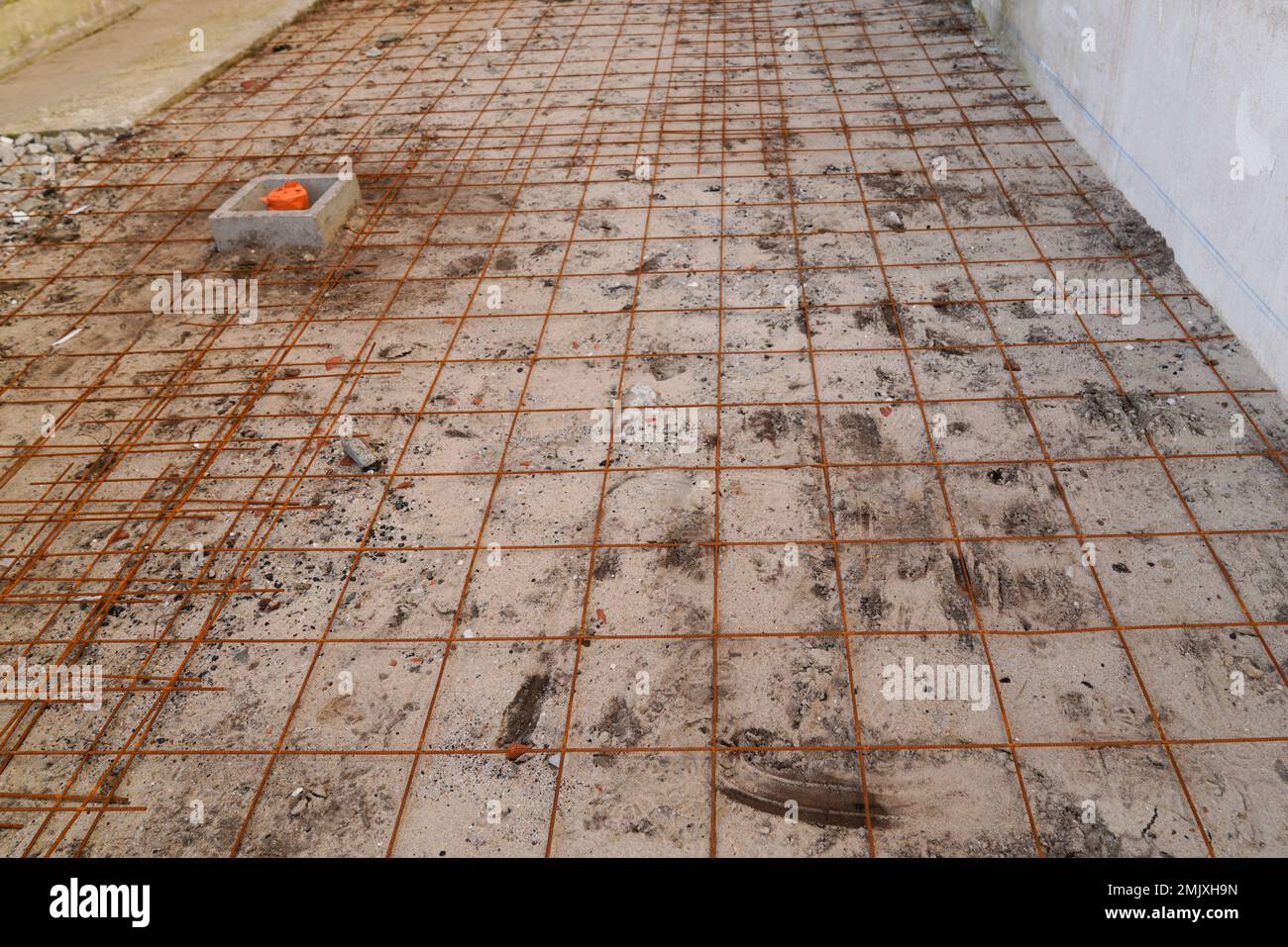 Concrete slab paving on hollow core slab flooring construction site ...