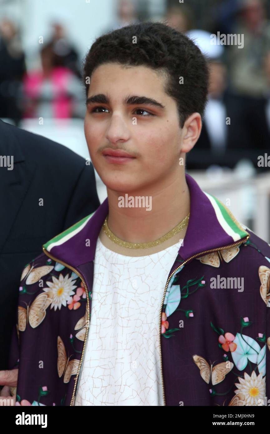 Actor Idir Ben Addi poses for photographers upon arrival at the ...