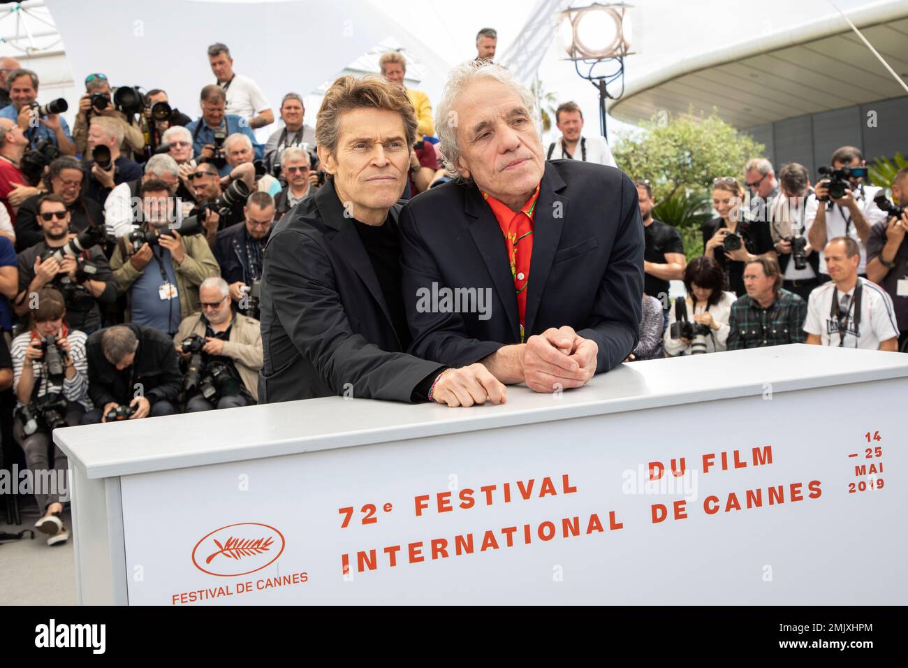 Actor Willem Dafoe, left, and director Abel Ferrara, right pose for ...