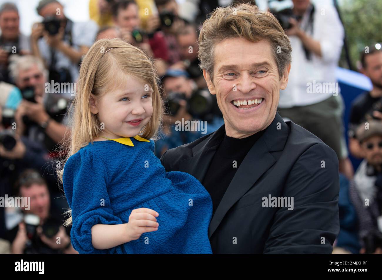 Actors Anna Ferrara, left, and Willem Dafoe pose for photographers at ...