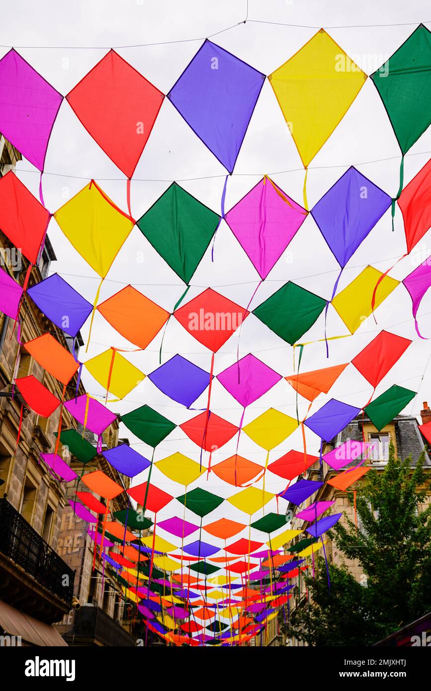 Artistic street decorated with colored flying deer kite in diamond ...