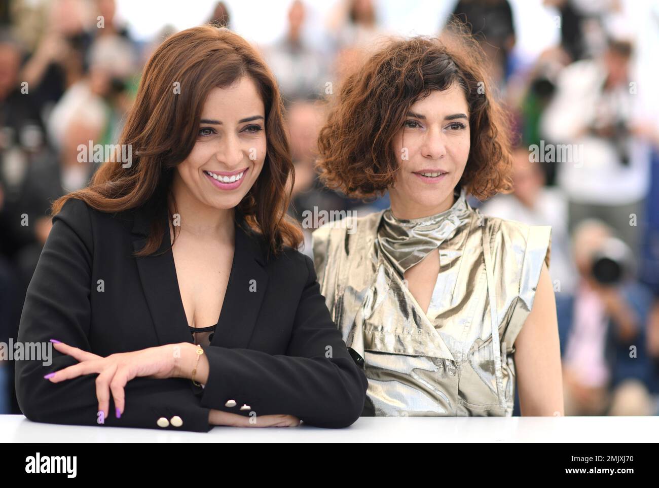 Actresses Nisrin Erradi, left, and Lubna Azabal pose for photographers ...