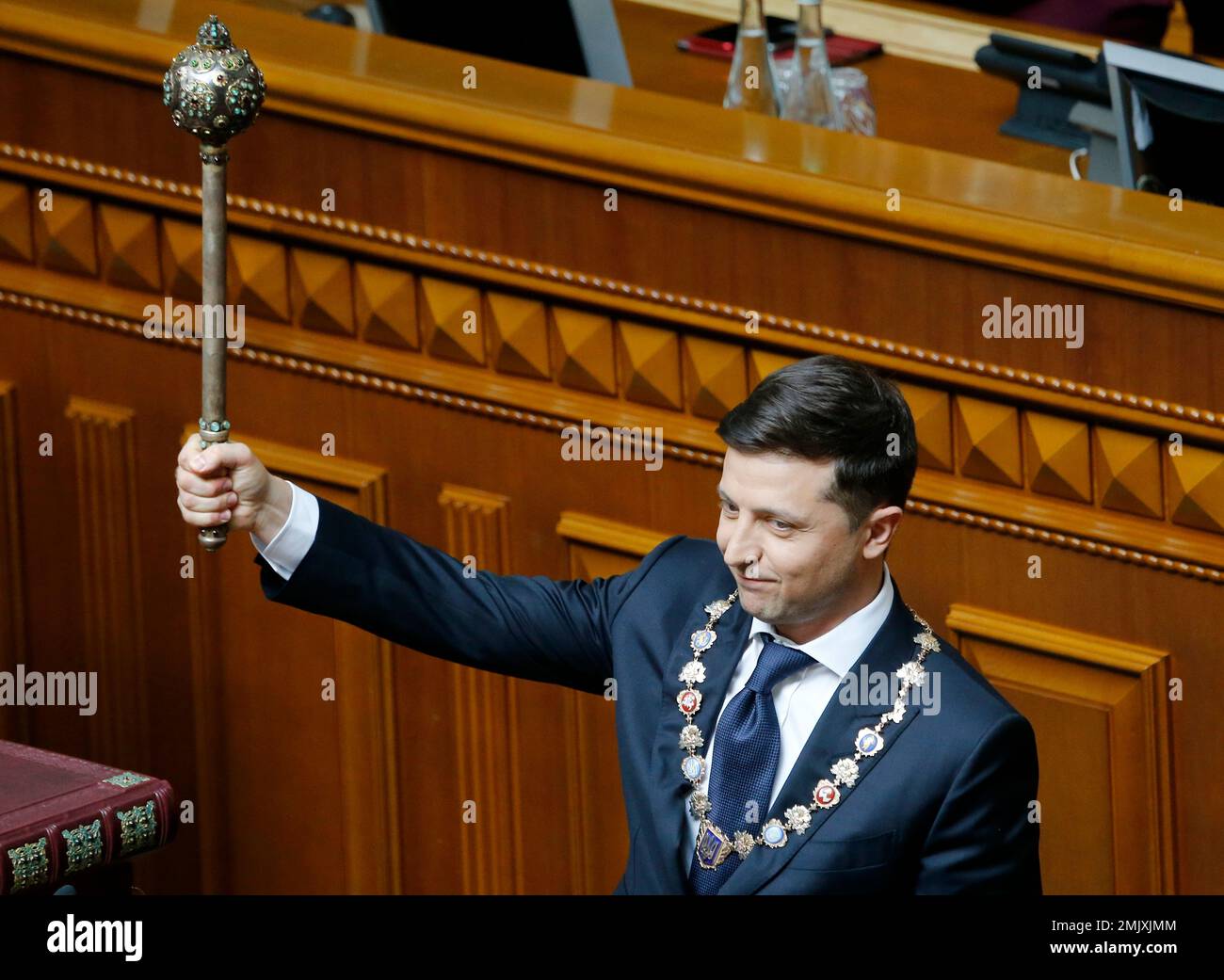 Ukrainian new President Volodymyr Zelenskiy holds the Ukrainian symbols ...