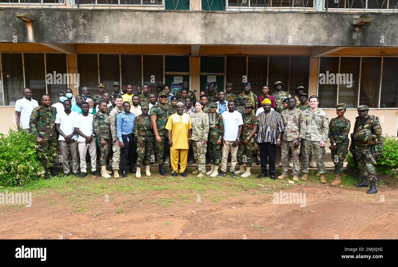 Participants pose for a group photo during a medical civic action ...